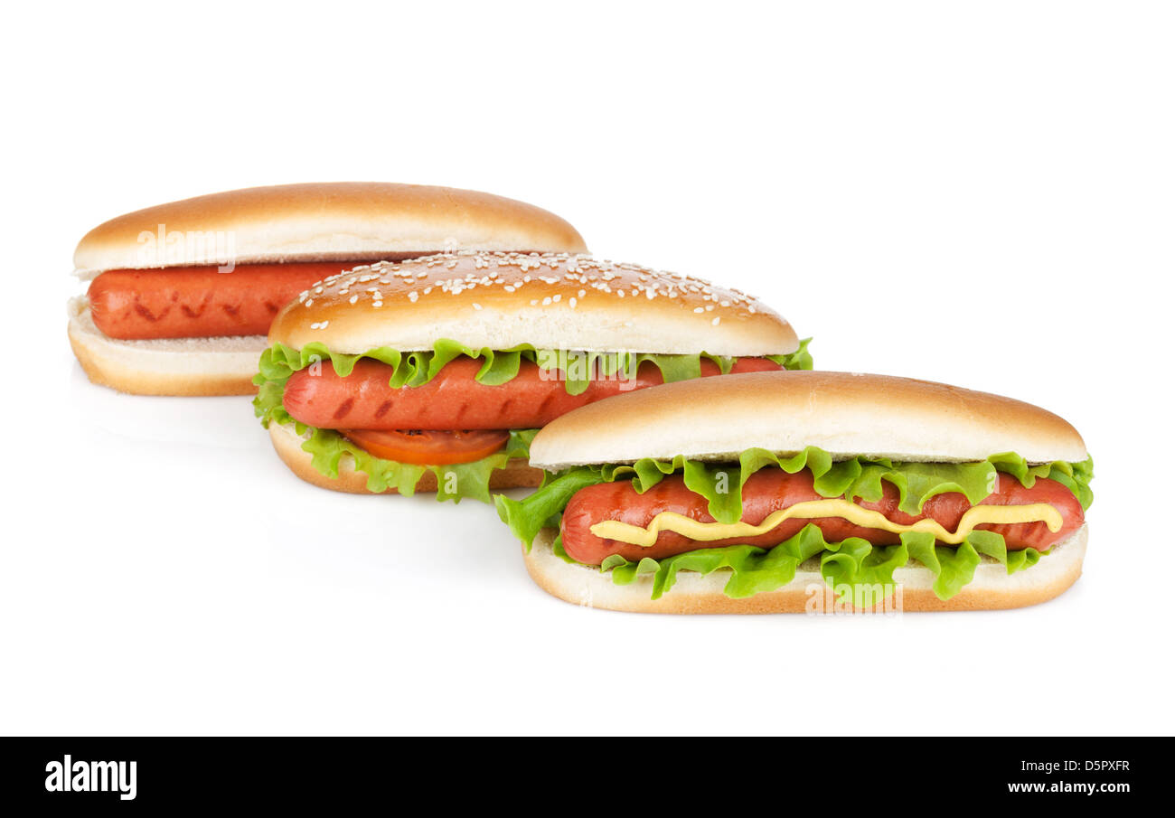 Three hot dogs with various ingredients. Isolated on white background ...