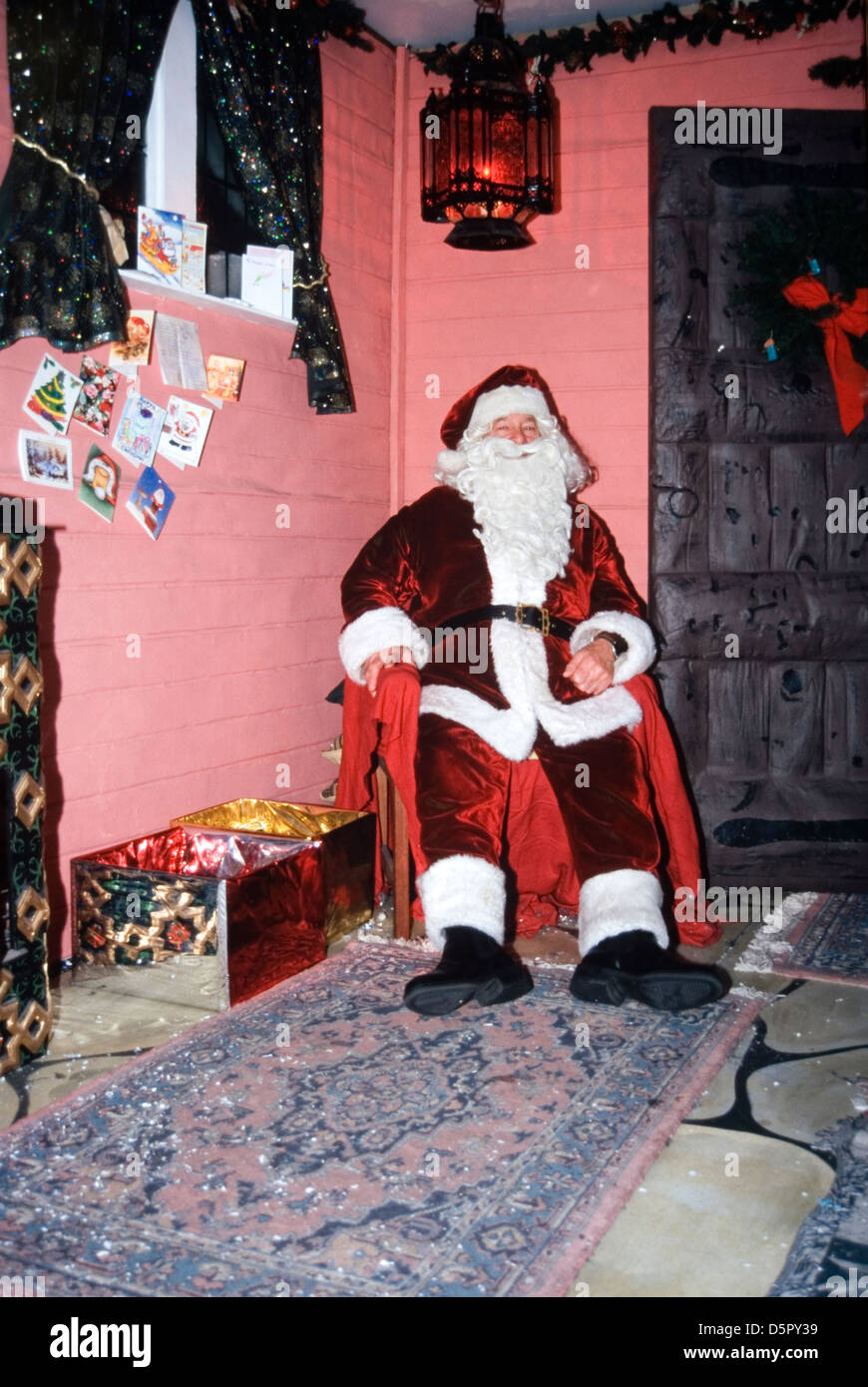 santa claus sitting in his grotto Stock Photo - Alamy