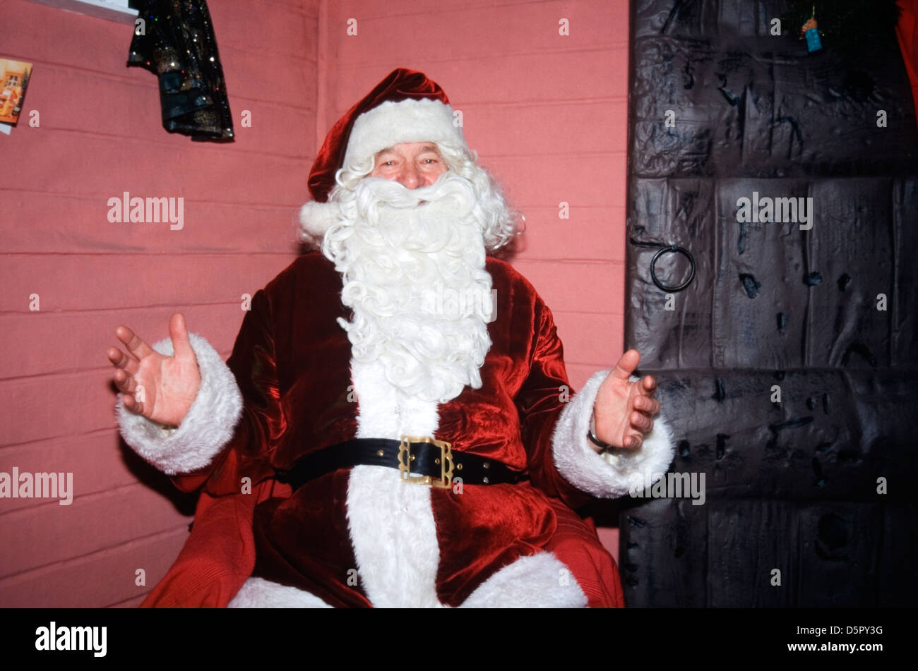 santa claus sitting in his grotto Stock Photo - Alamy