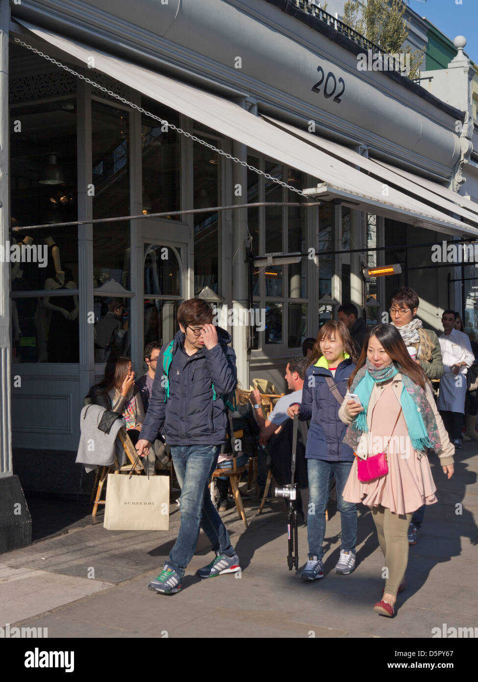 Customers at trendy 202 cafe and restaurant in Westbourne Grove ...
