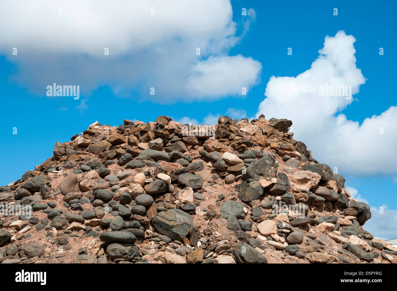 large stone mountain with blue sky background Stock Photo - Alamy
