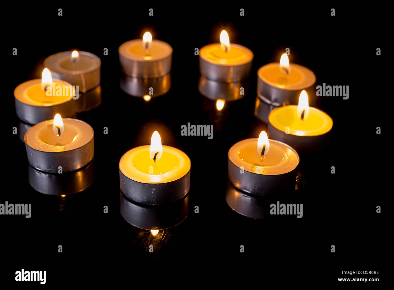 small candles in a circle Stock Photo - Alamy
