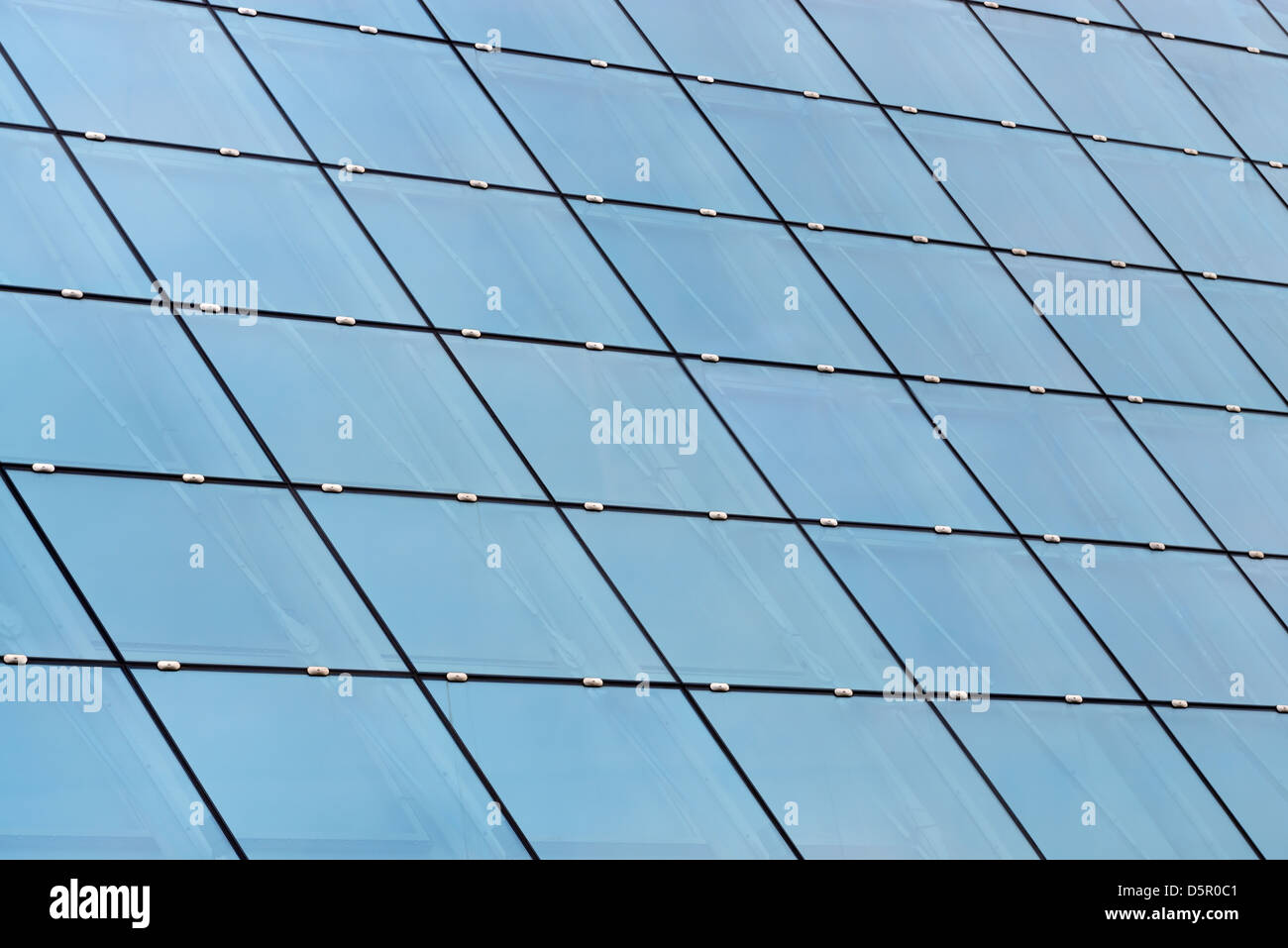 Glass blue wall surface of modern building Stock Photo - Alamy