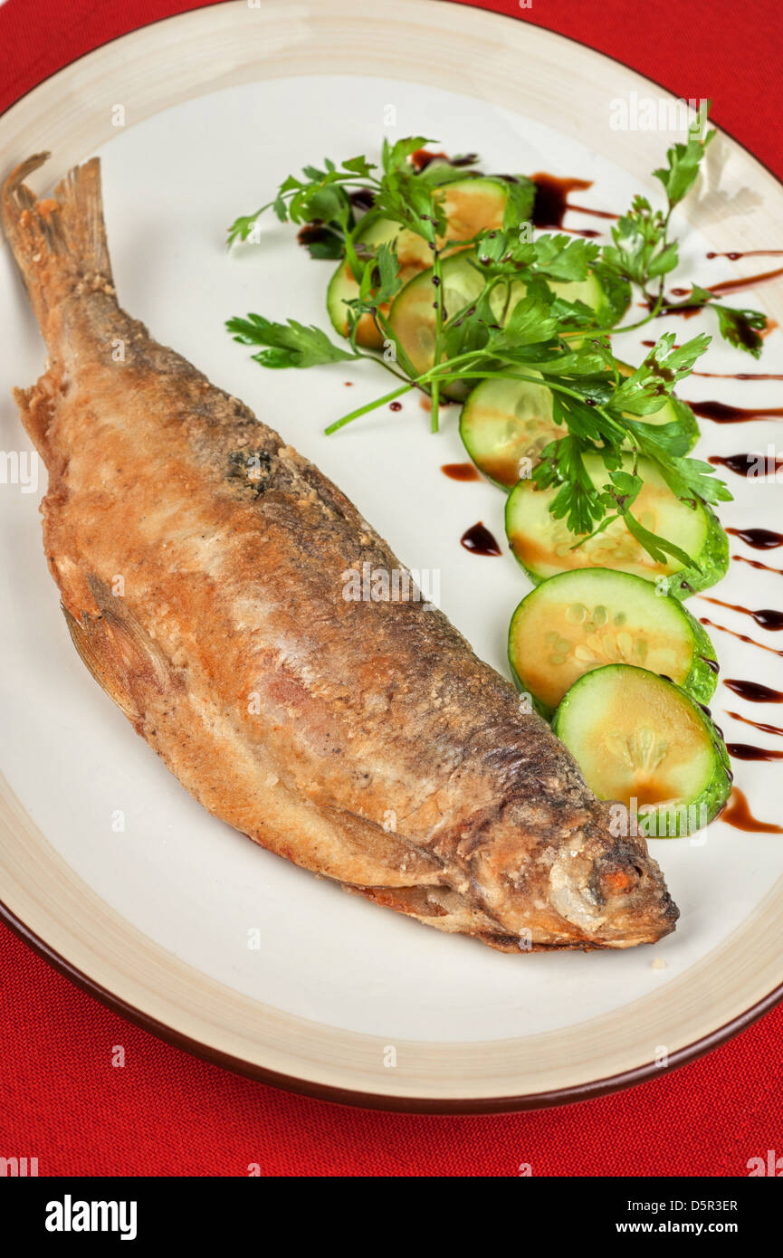 Fried peled fish Stock Photo - Alamy