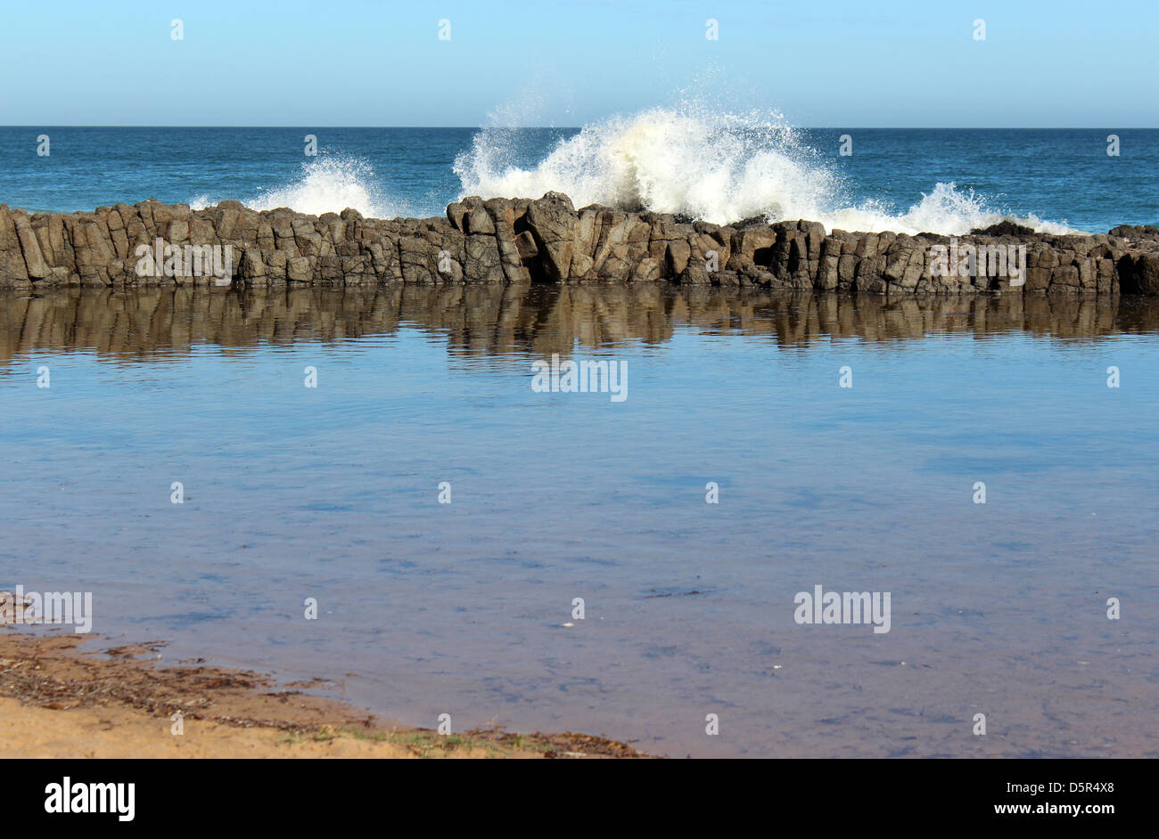 Waves of the Indian Ocean splashing on basalt rocks Bunbury Western ...