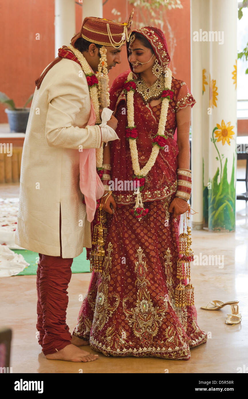 Newly wed Indian couple at their Wedding ceremony Stock Photo - Alamy