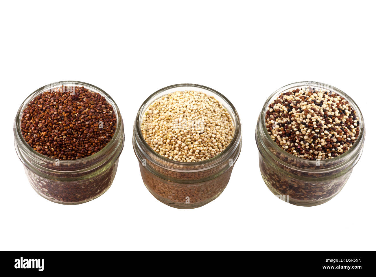 Red, golden (white) and tricolor Quinoa in small jars (Chenopodium ...