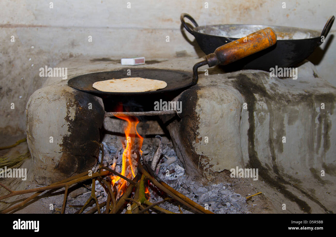 Indian woman preparing food Stock Photo - Alamy