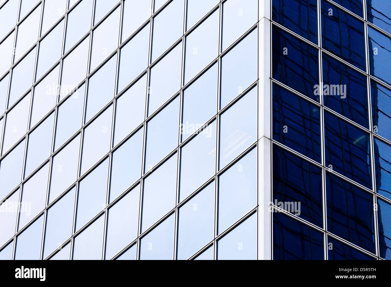 Glass windows in a modern high-rise building Stock Photo - Alamy