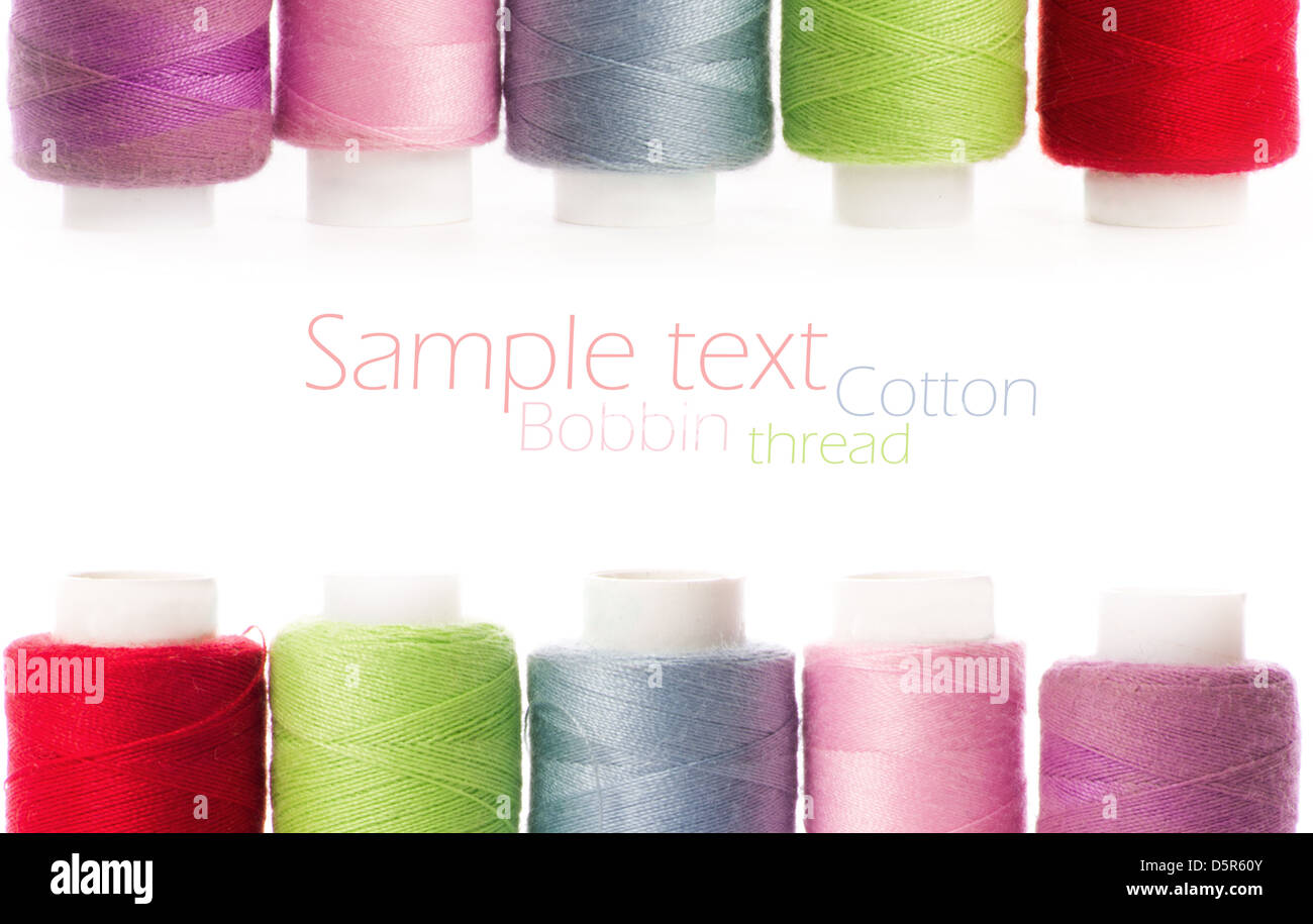 bobbins of thread isolated on white Stock Photo - Alamy