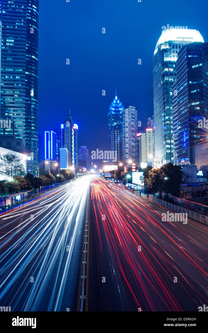 Fast moving cars at night Stock Photo - Alamy