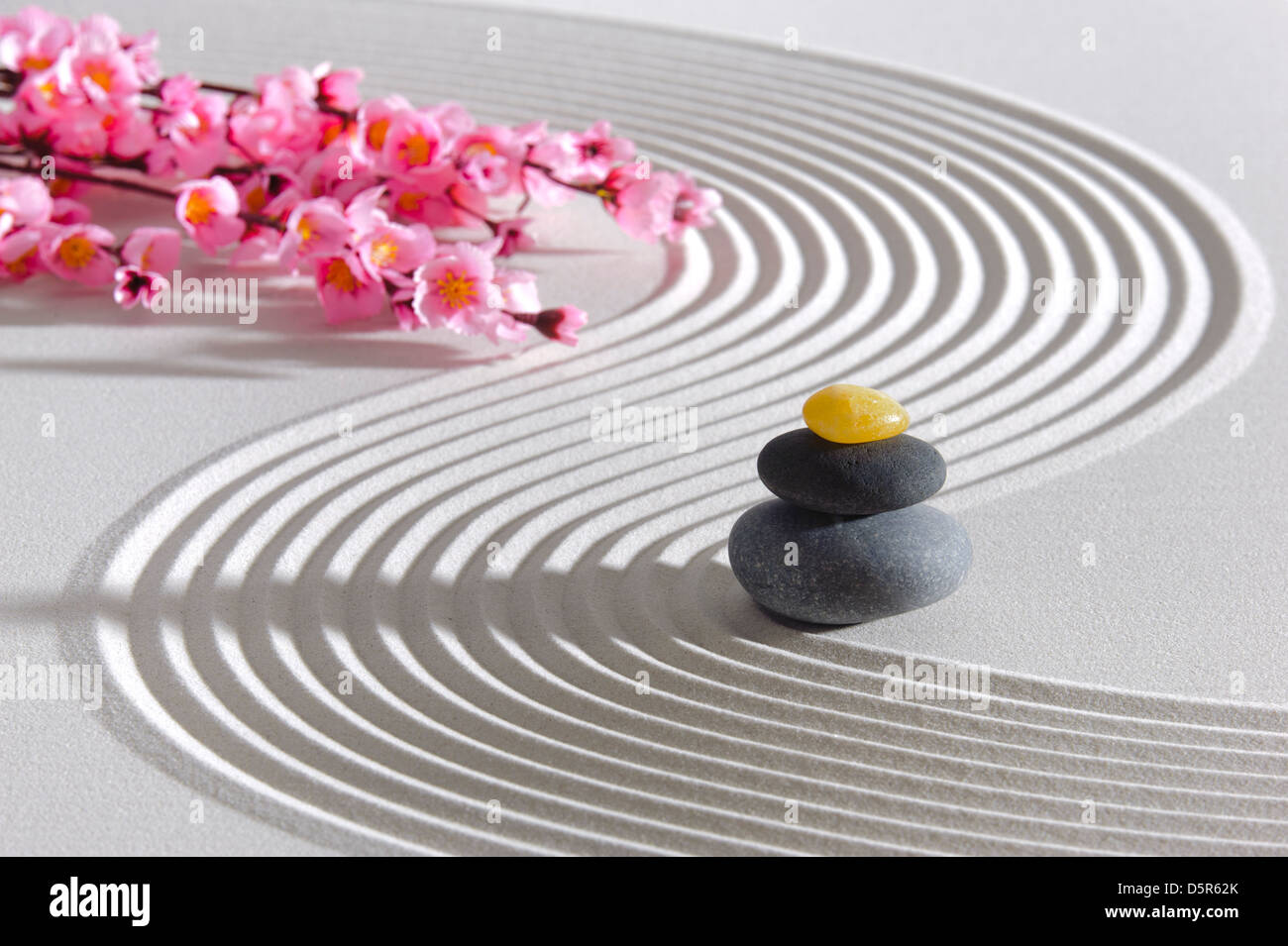 Japanese zen garden of meditation with stone and structure in sand ...