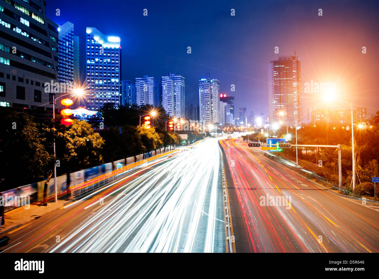 Fast moving cars at night Stock Photo - Alamy