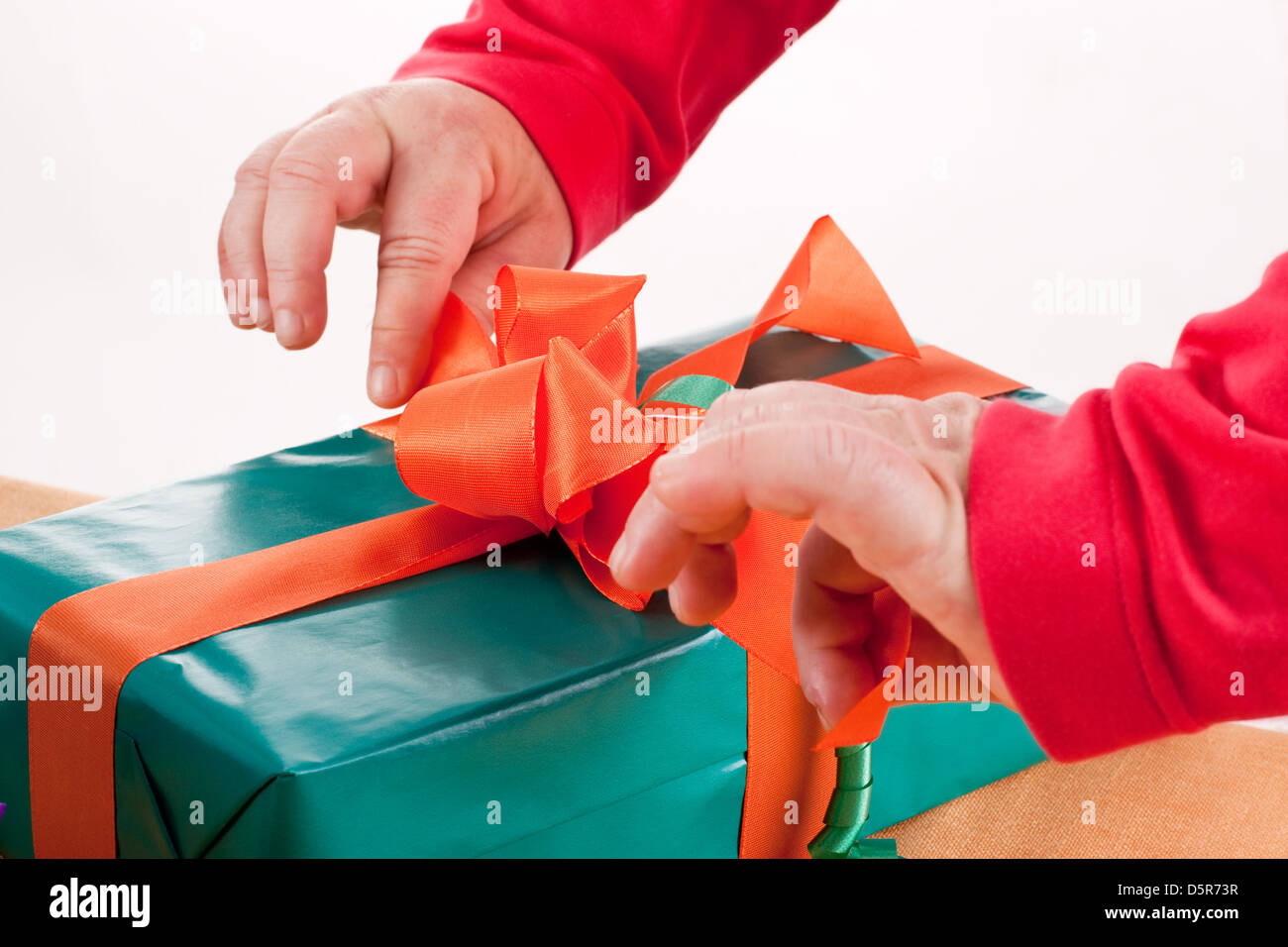mentally disabled woman pack or unpack a present Stock Photo - Alamy