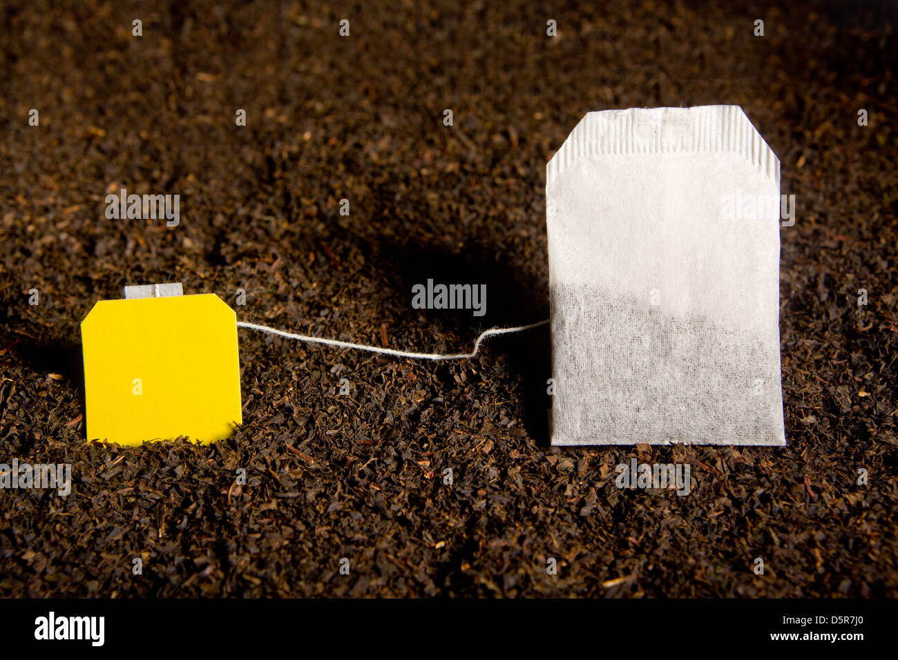 Tea bag yellow label hi-res stock photography and images - Alamy