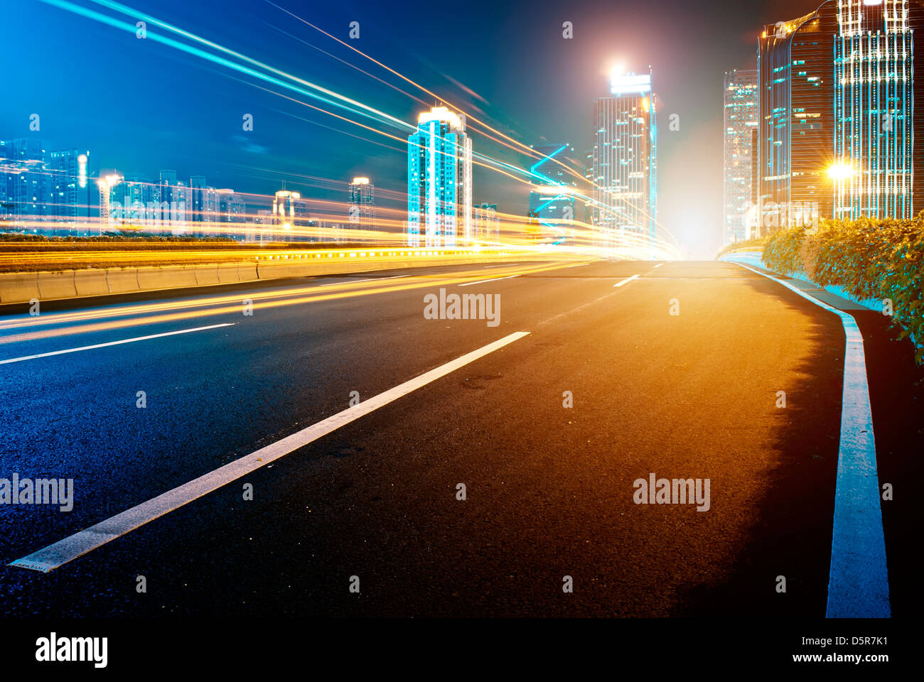 Fast moving cars at night Stock Photo - Alamy