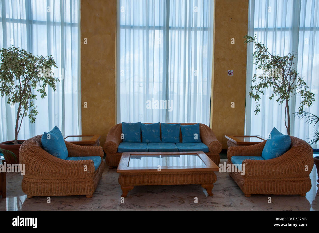 lounge with tables and sofas and decorations Stock Photo - Alamy