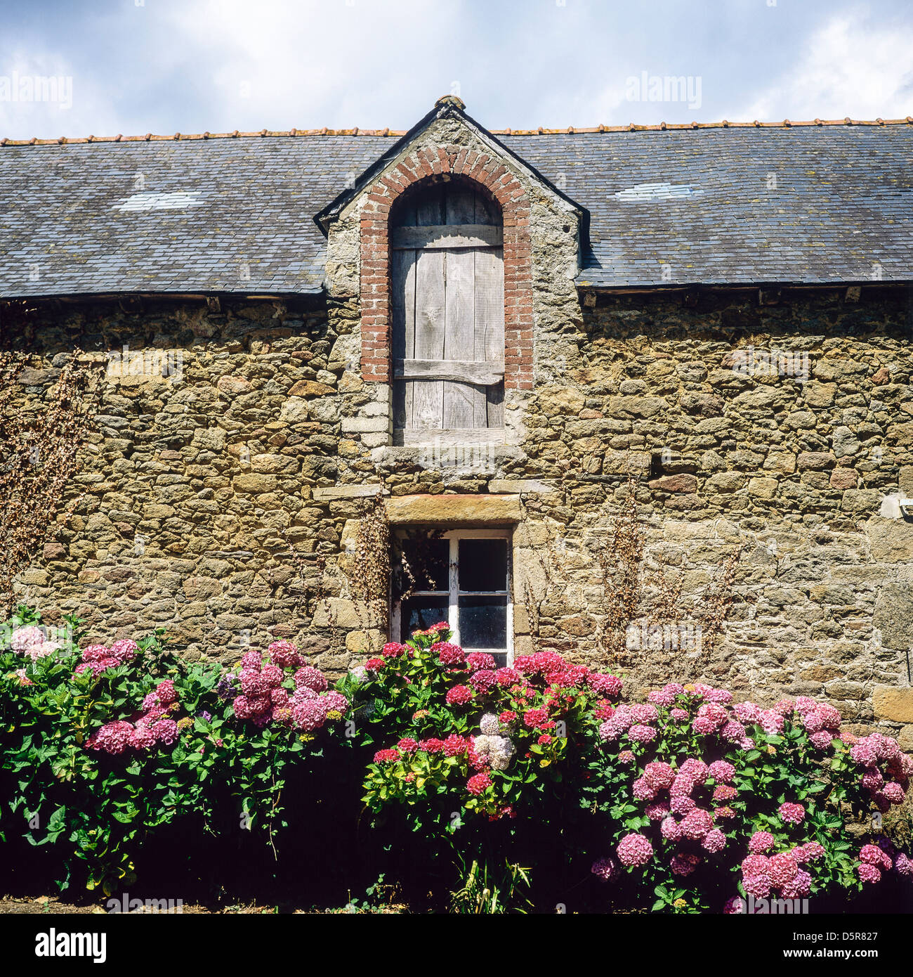 Flowered farm house Brittany France Stock Photo - Alamy