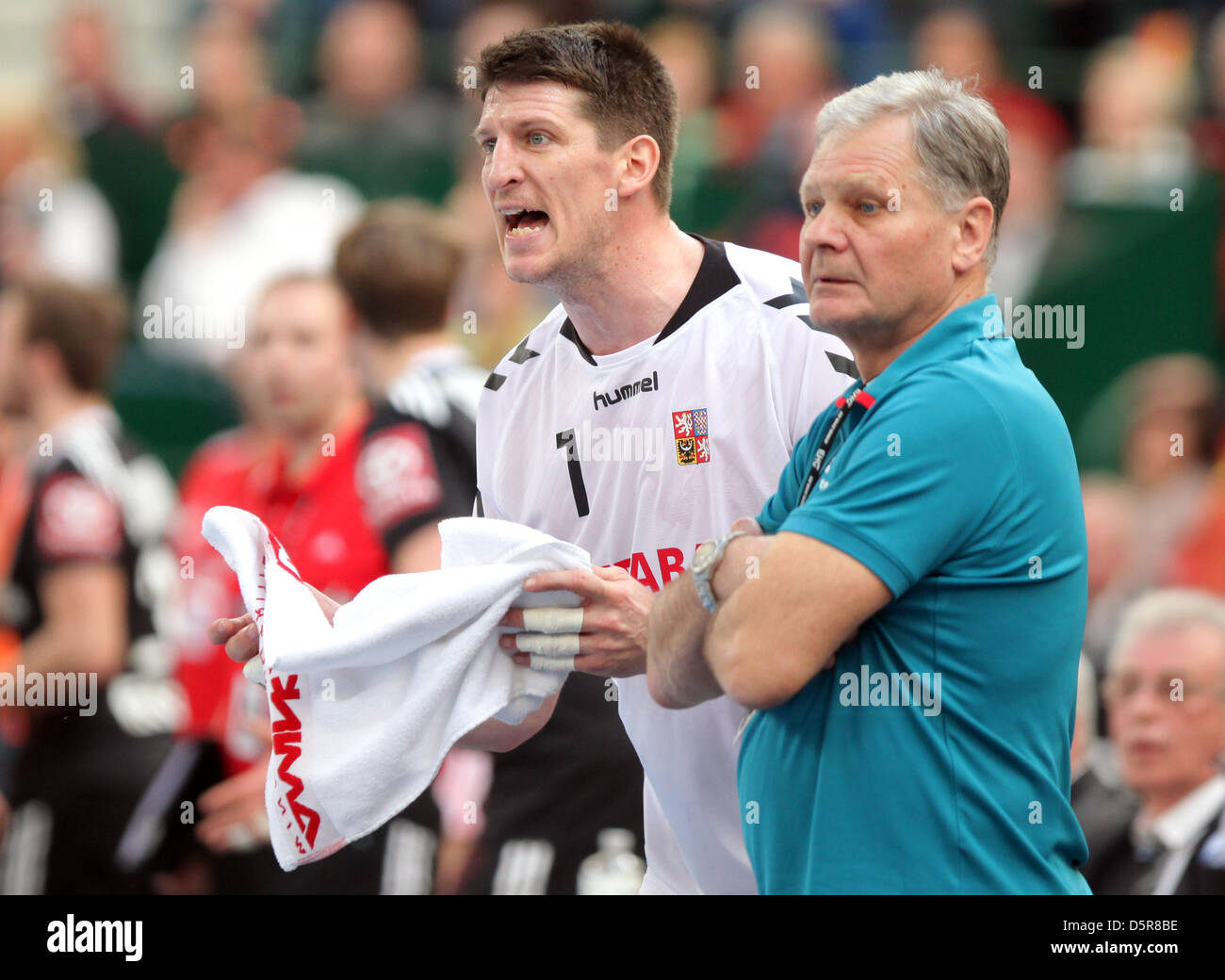 Czech player Daniel Kubes (L) and head coach Vladimir Haber gesture and ...