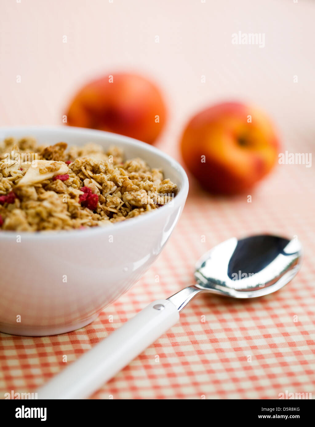 Breakfast cereal with dryed fruits and fresh peaches Stock Photo - Alamy