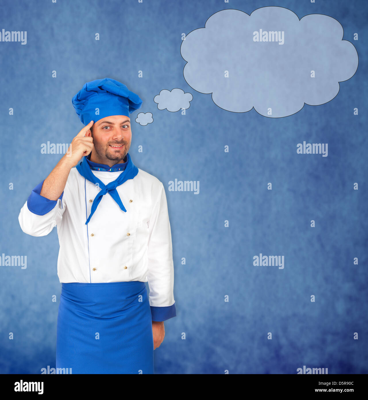 Young chef think on blue background Stock Photo - Alamy