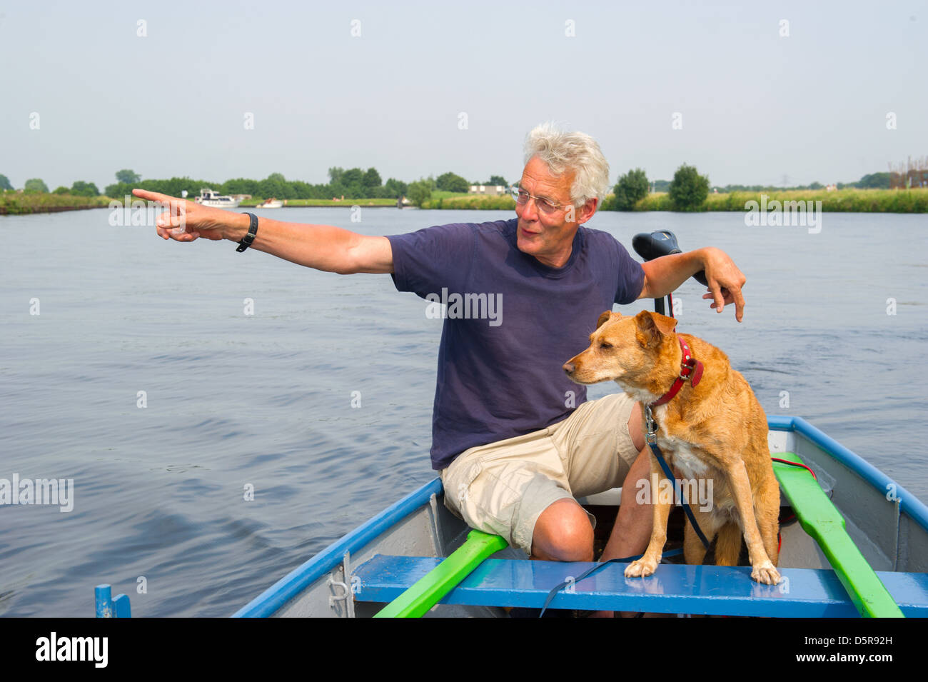 Man boat dog rowing hi-res stock photography and images - Alamy