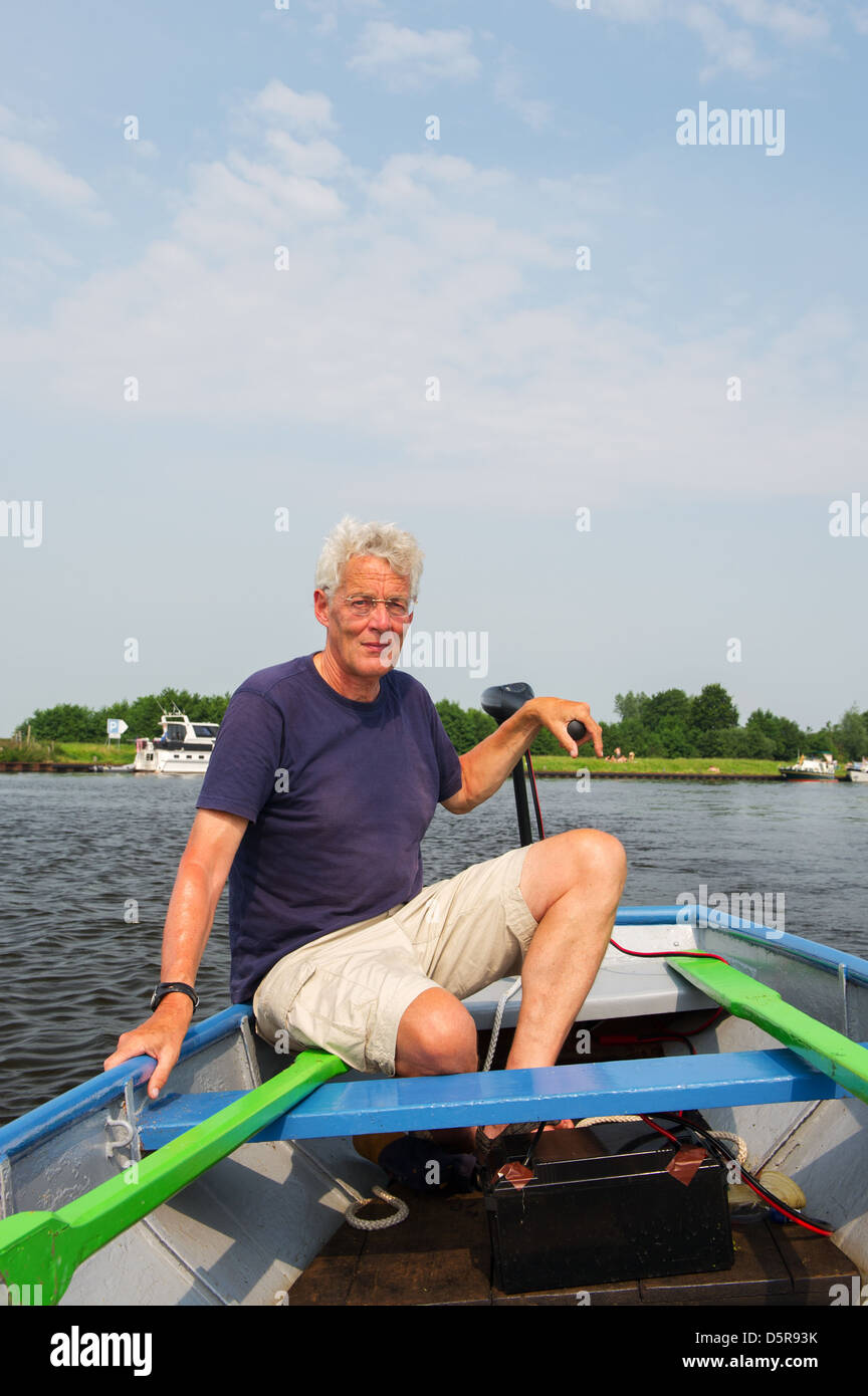 Man in motor boat hi-res stock photography and images - Alamy