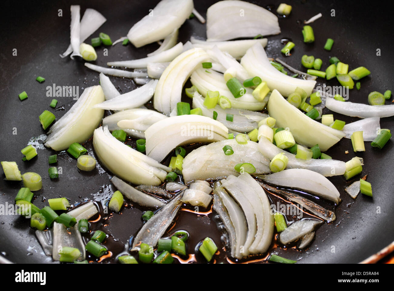 Cooking fried onions in pan hi-res stock photography and images - Alamy