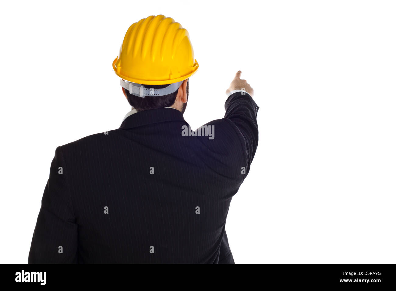 A handsome engineer pointing on white background Stock Photo - Alamy
