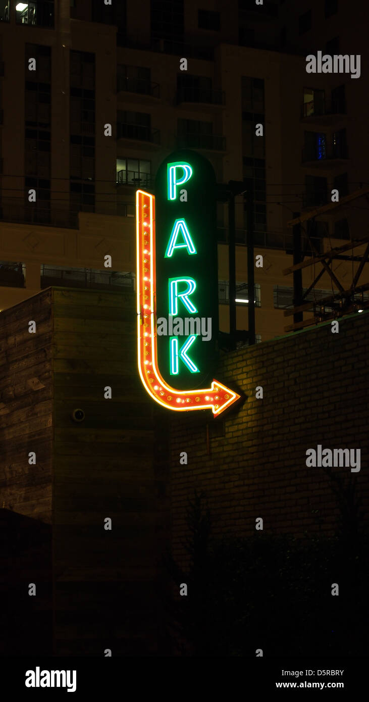 Neon car park sign Stock Photo - Alamy