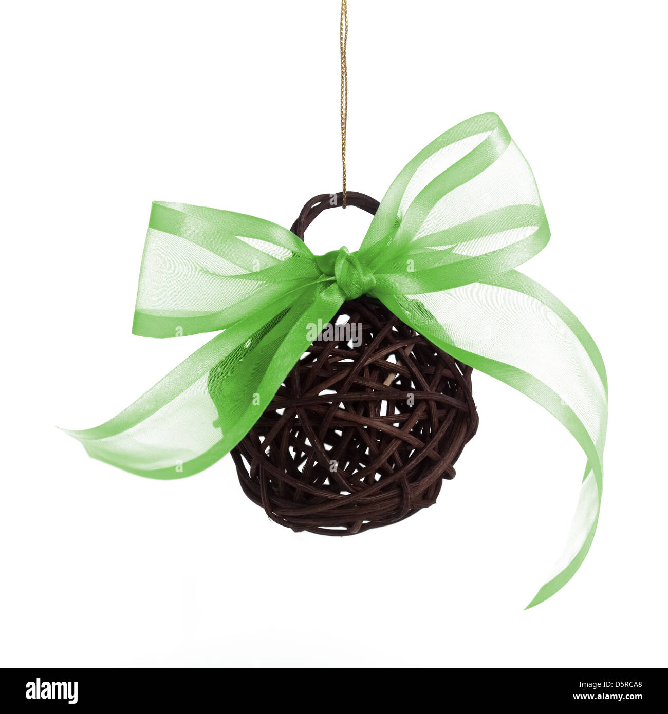 Willow ball decoration with green bow Stock Photo - Alamy