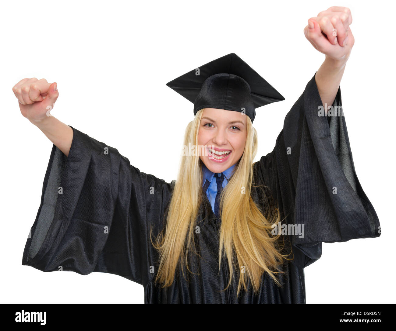 Happy young woman in graduation gown rejoicing success Stock Photo - Alamy