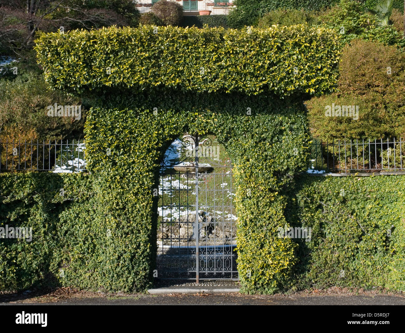 gate in a hedge, Tremezzo, Italy Stock Photo - Alamy