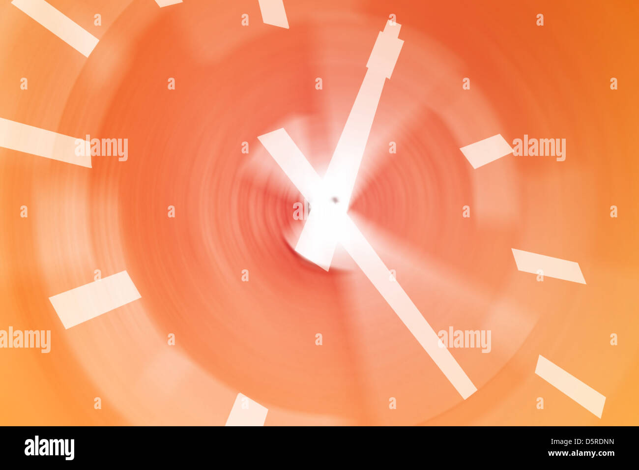 Clock with motion blur background Stock Photo - Alamy