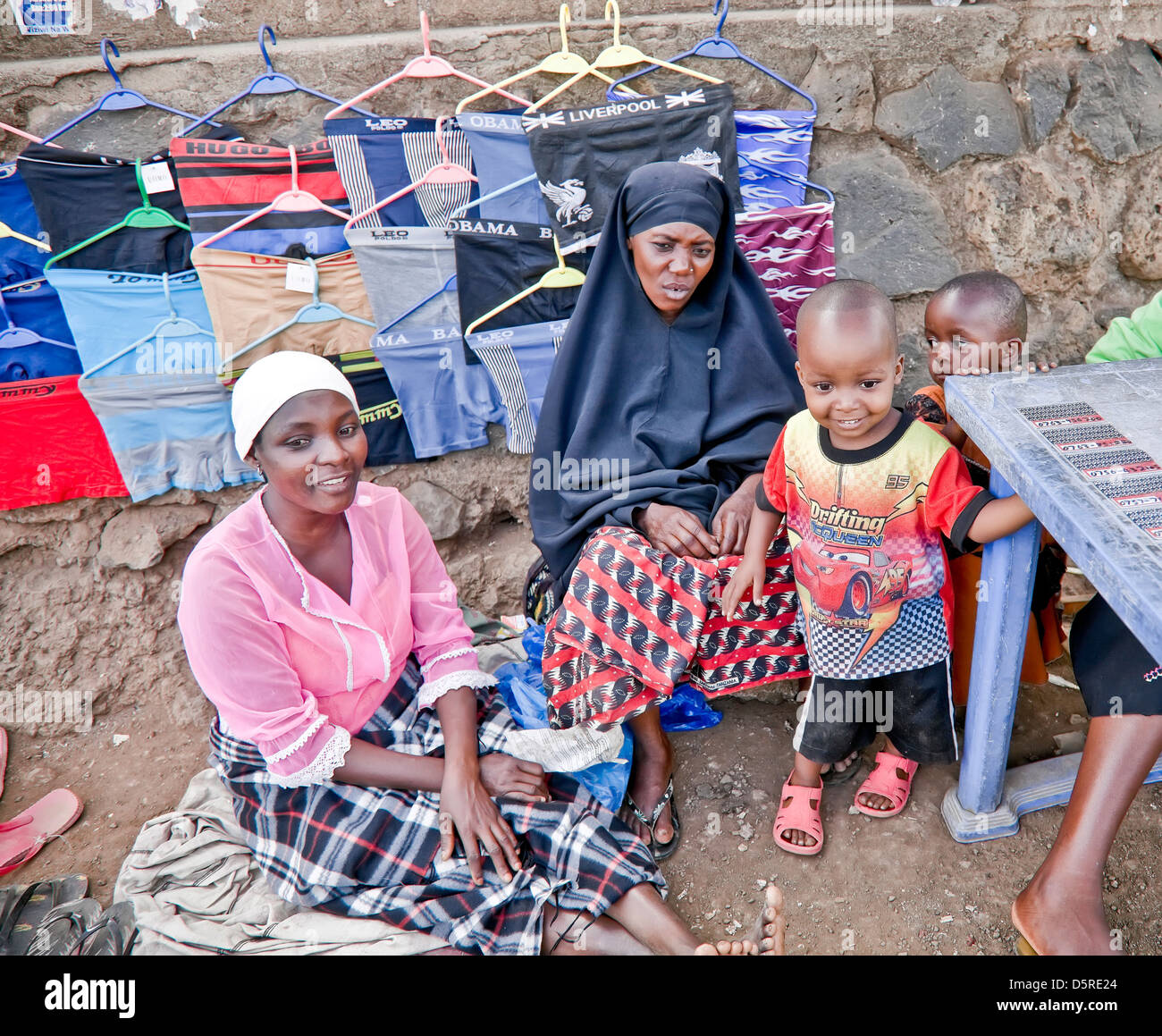 Woman children selling fruit hi-res stock photography and images - Alamy