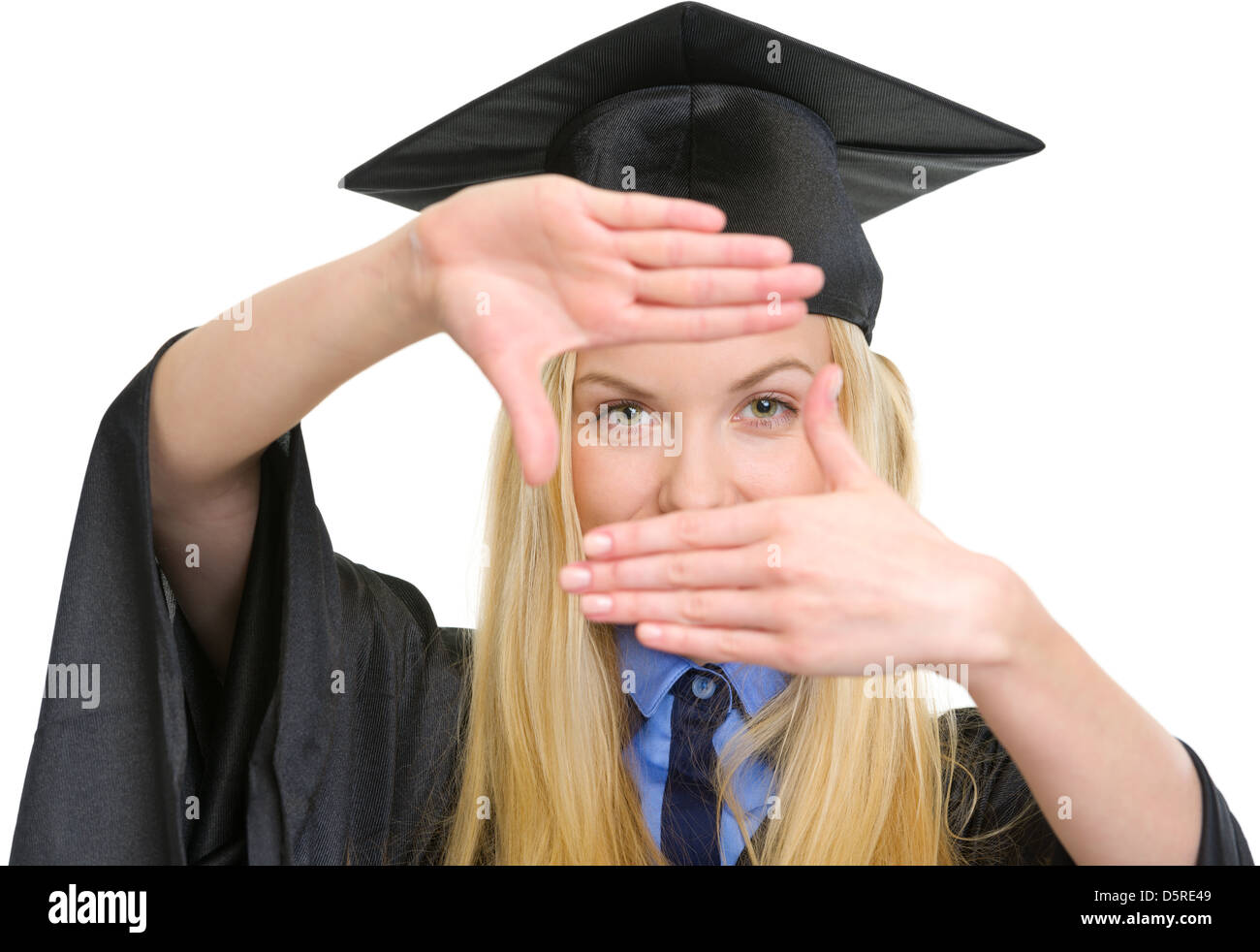 Young woman in graduation gown framing with hands Stock Photo - Alamy