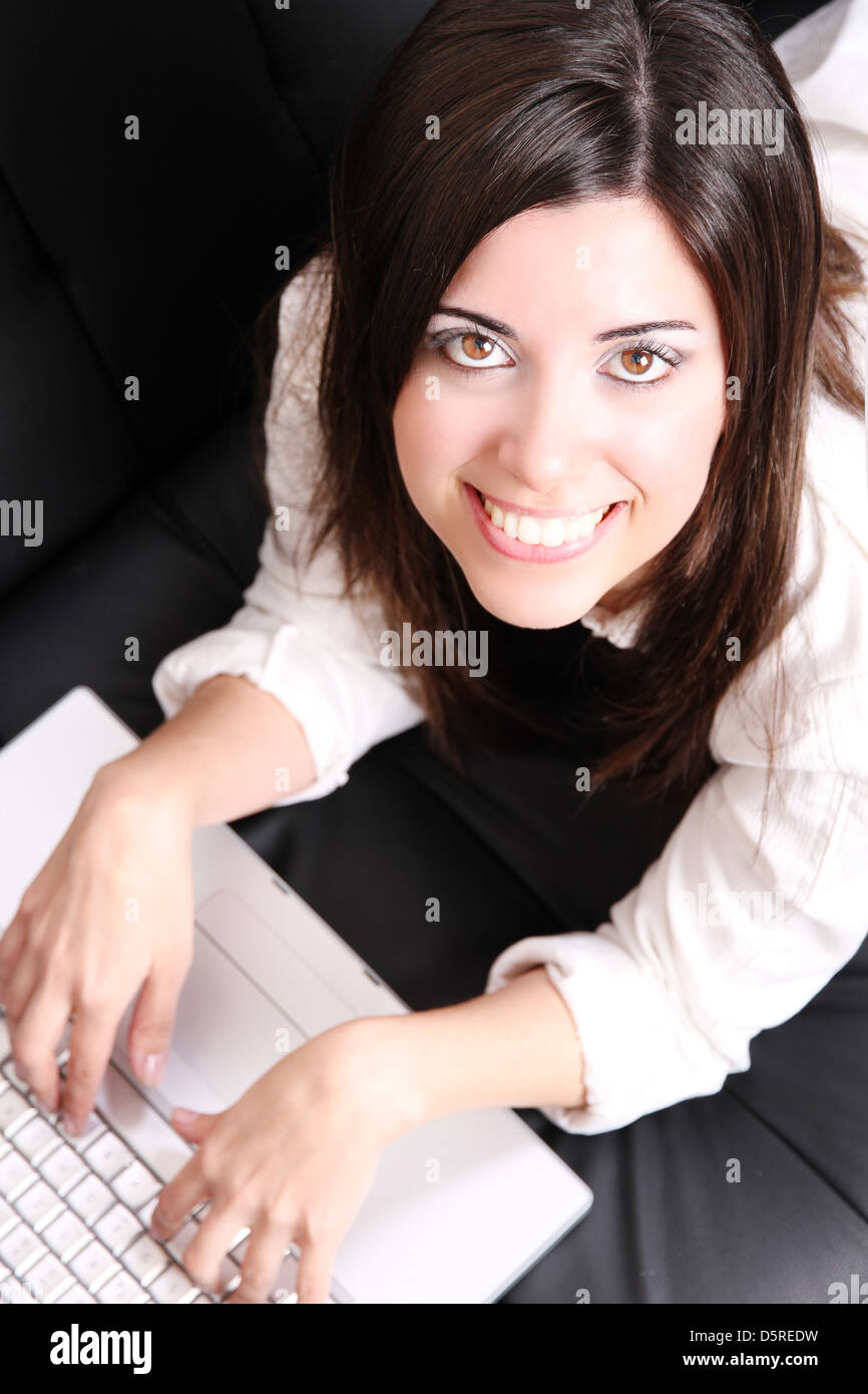 A young woman surfing on the Internet with a Laptop Stock Photo - Alamy