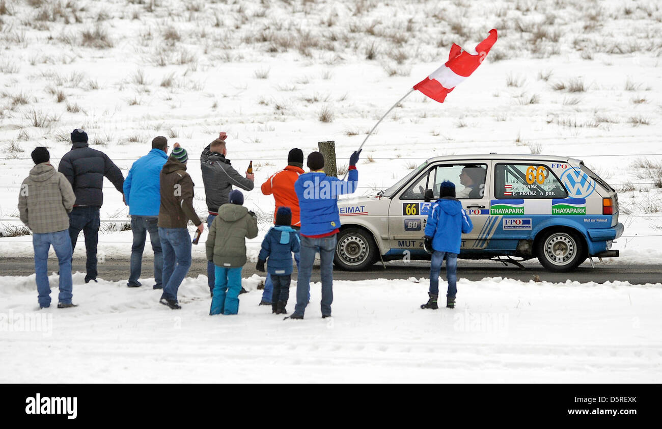 Austrian fans are greeting Michael Franz and Erwin Franz in their car ...