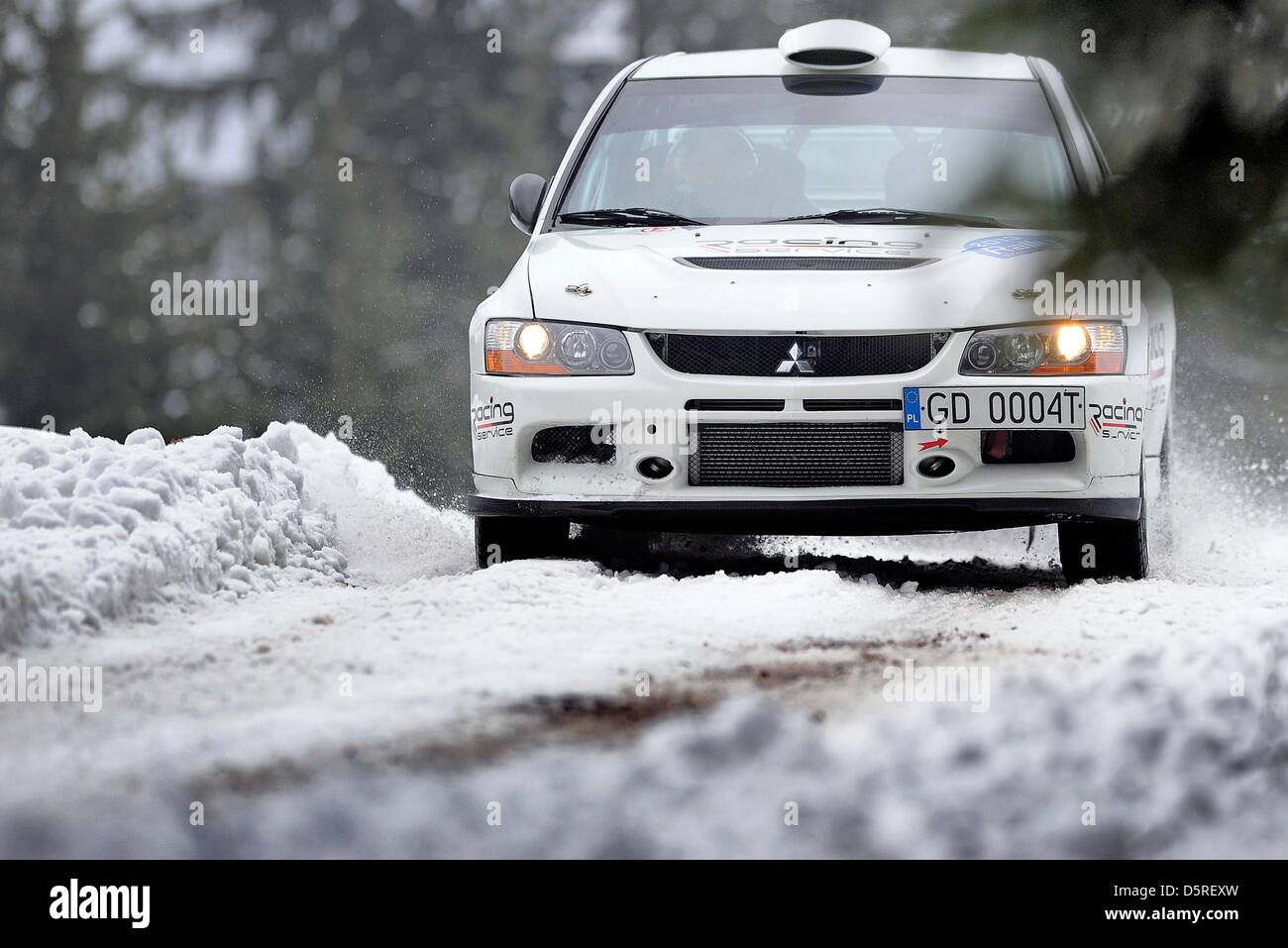 Polish race car driver Mariusz Malyszczycki and his navigator Jack ...