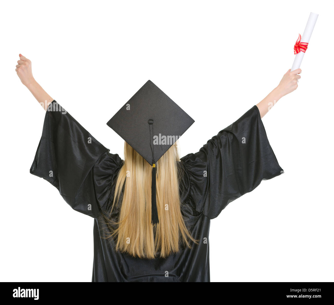 Woman in graduation gown rejoicing success . rear view Stock Photo - Alamy