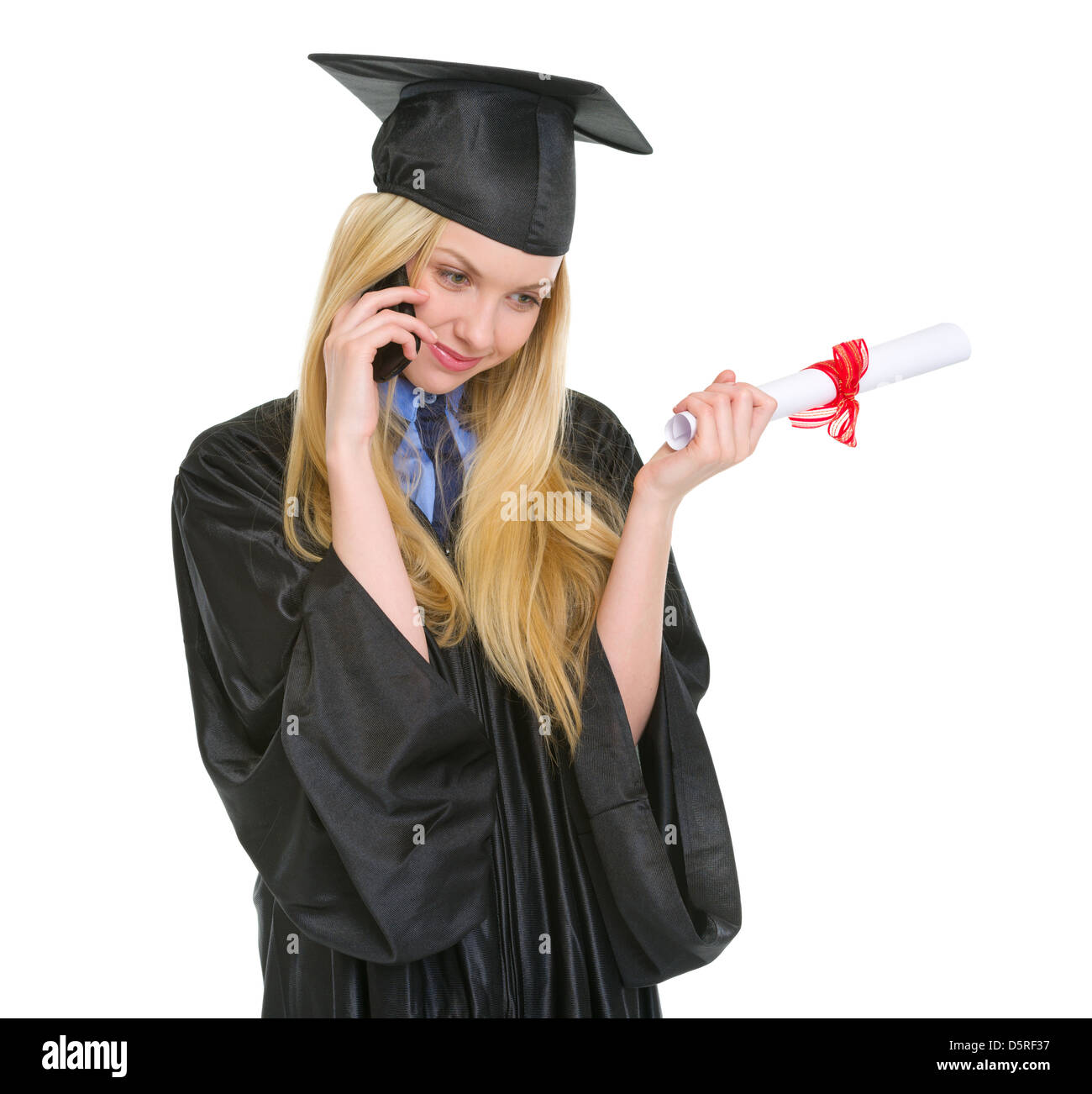 Young woman in graduation gown with diploma talking mobile phone Stock ...