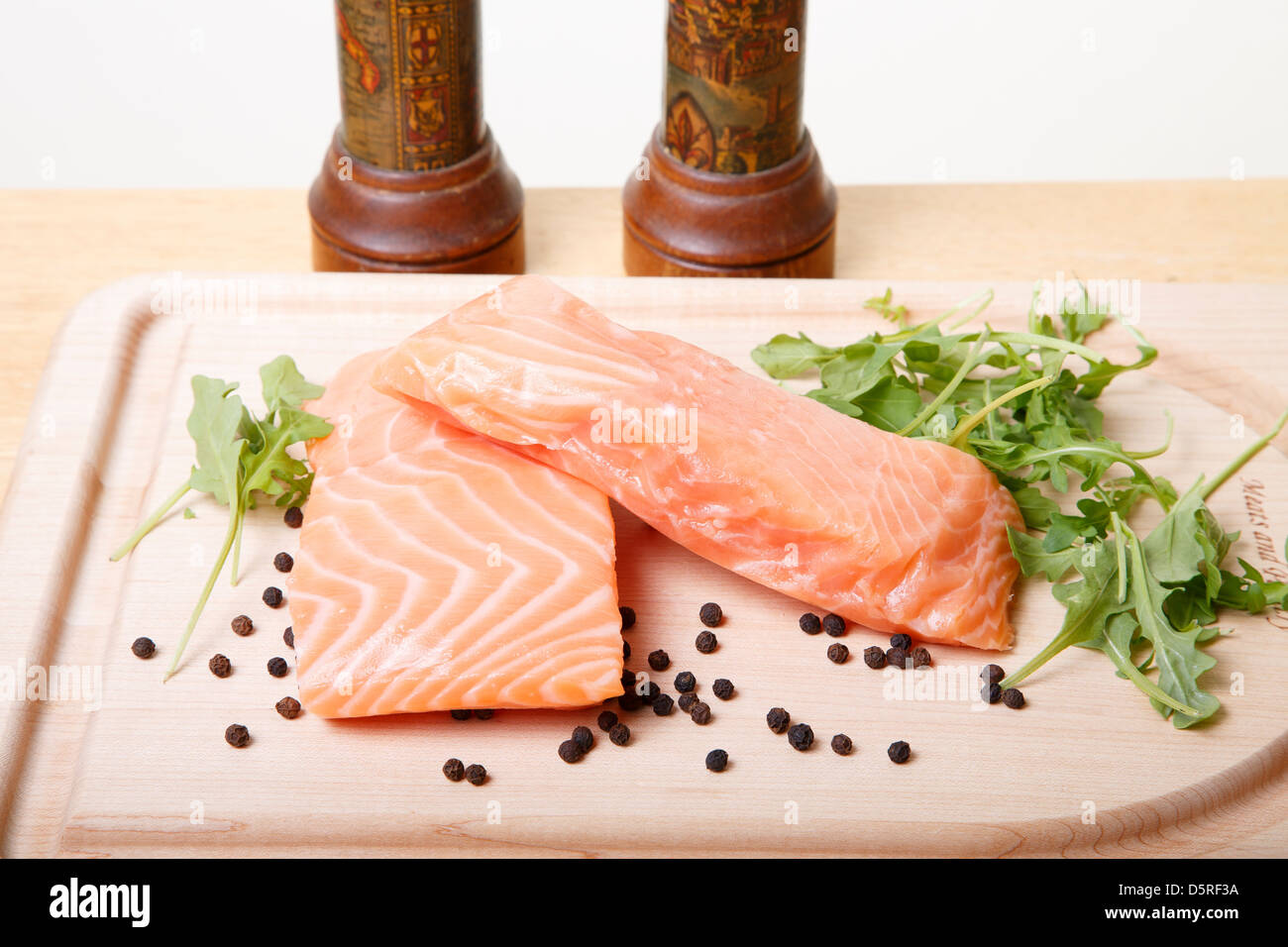 Fresh raw Atlantic salmon being prepared Stock Photo - Alamy