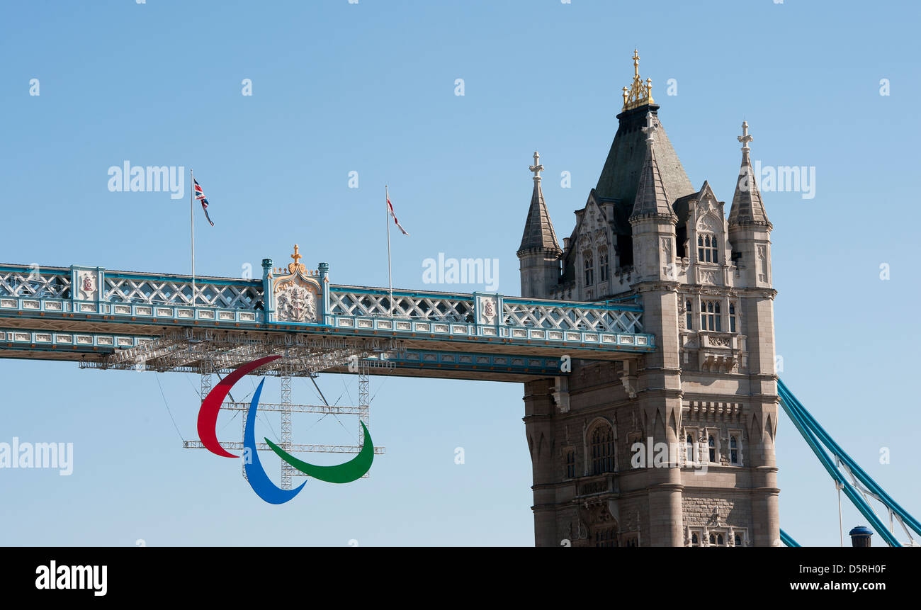 Symbol of the Paralympics hanging from Tower Bridge during the London ...