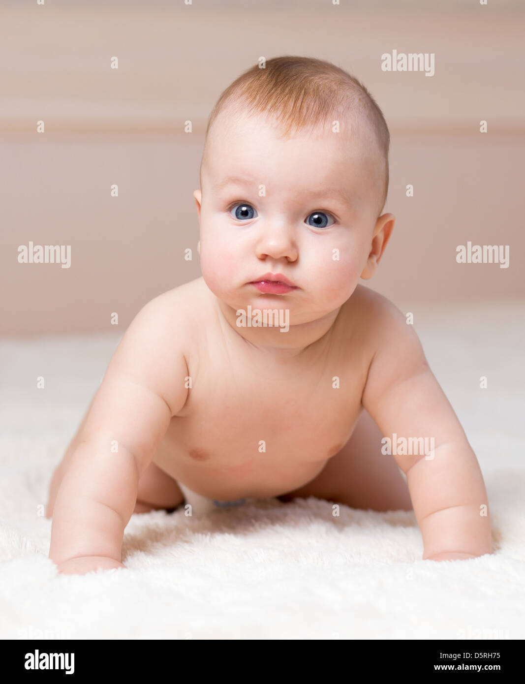 cute crawling baby boy Stock Photo - Alamy