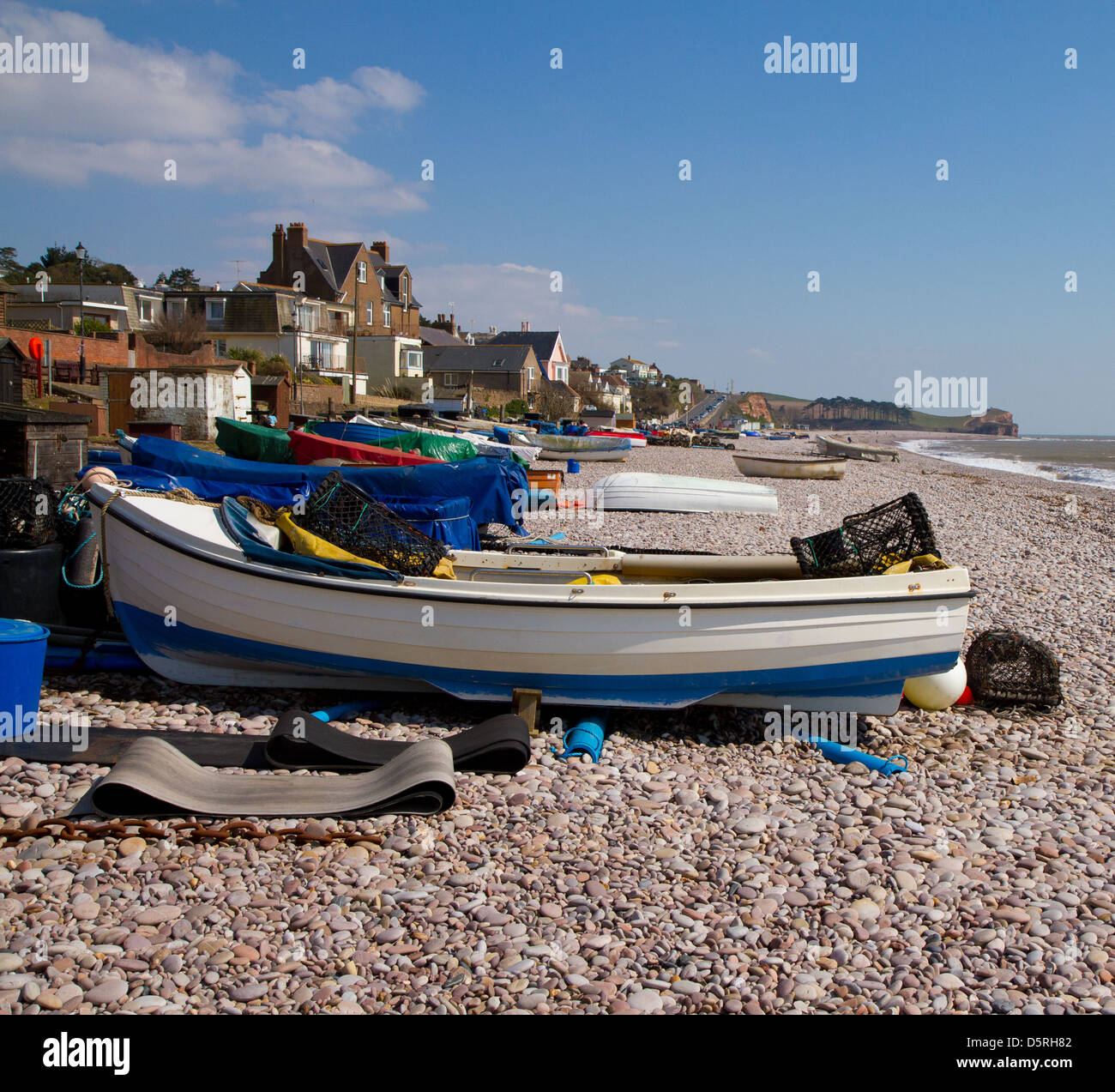 Boats on pebble beach Budleigh Salterton Devon England UK Stock Photo ...