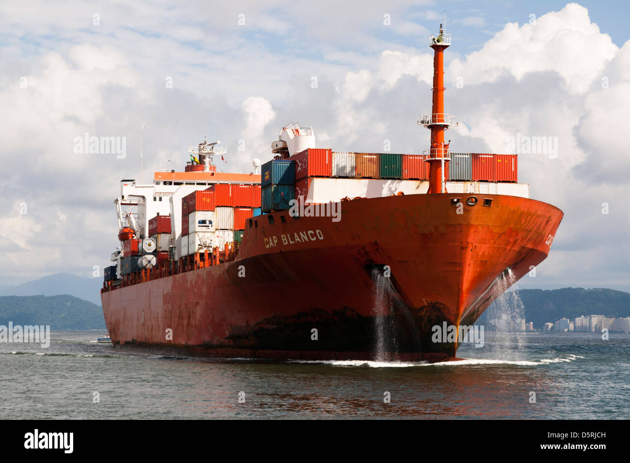 Container cargo vessel coming to Santos port, São Paulo state shore ...