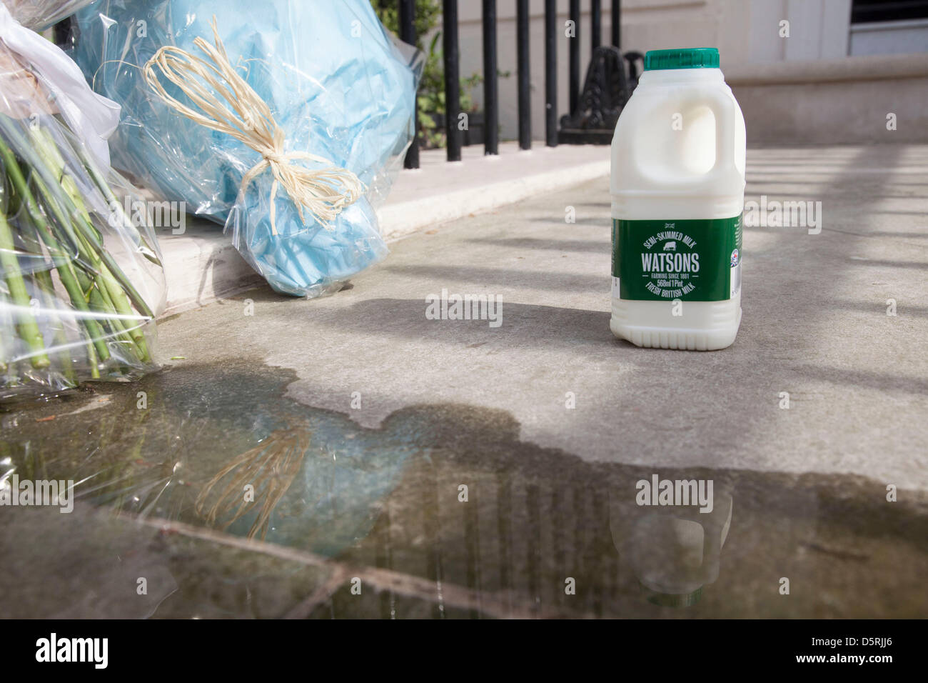 Bottle of milk left at the London residence on Chester Square of ...