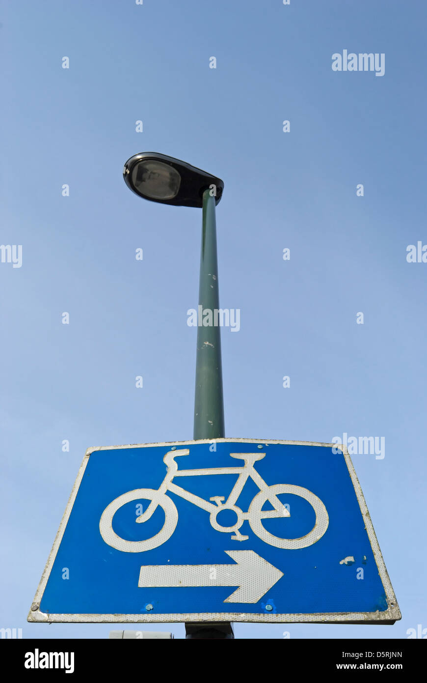 right pointing sign with arrow showing direction of cycle route ...