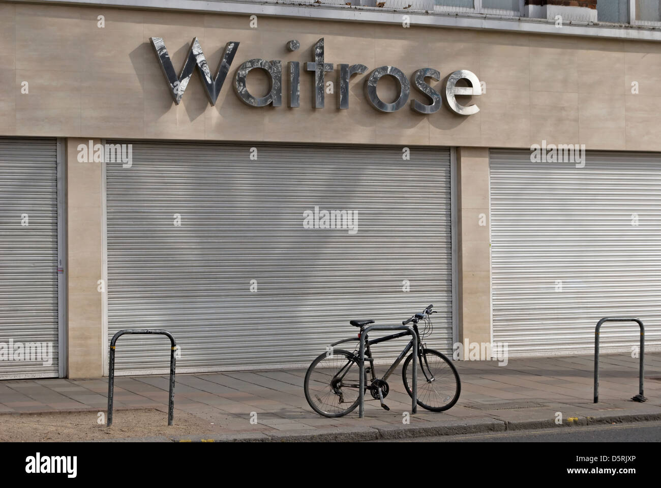 a closed branch of waitrose and a parked bike, chiswick, london ...