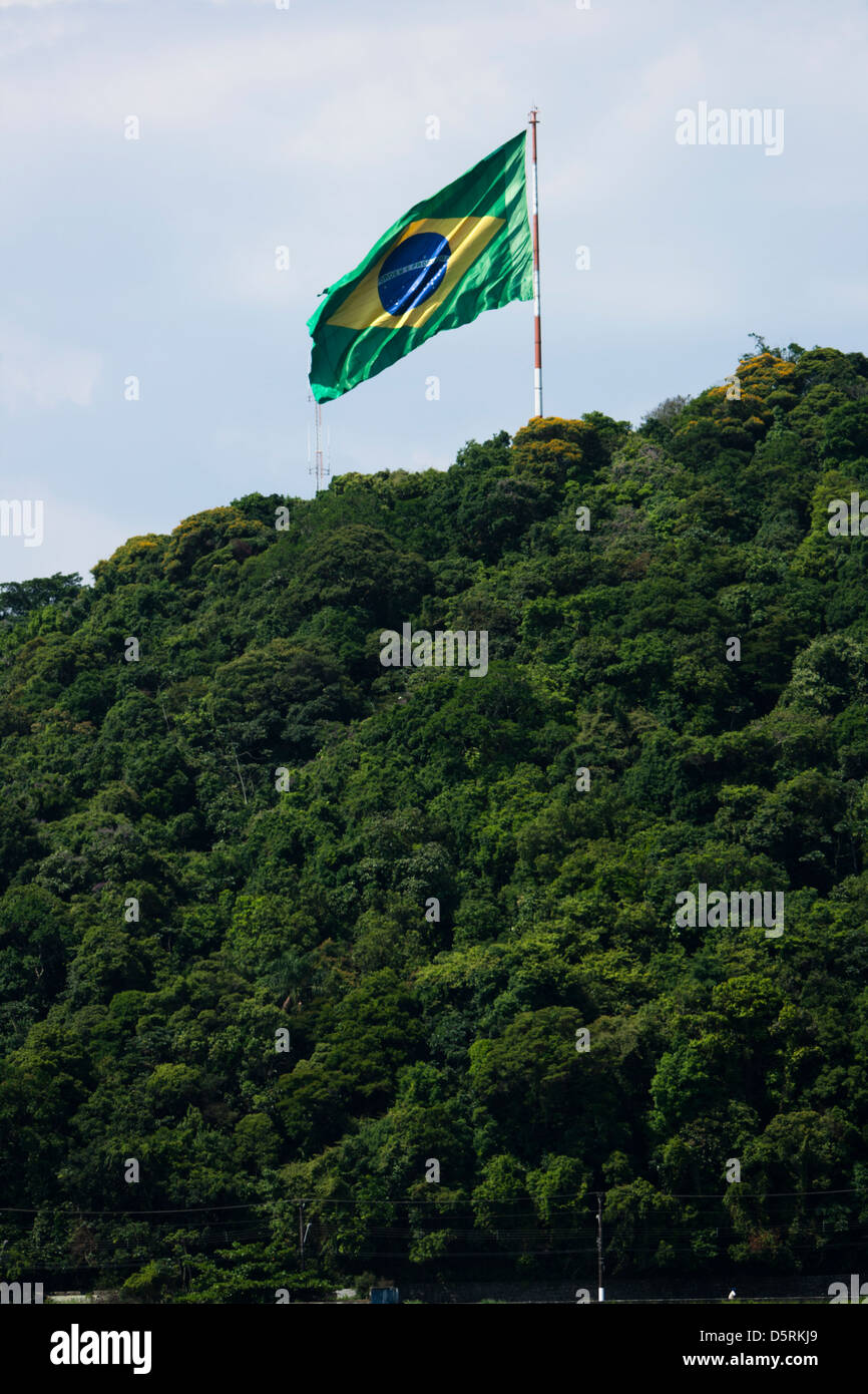 Brazil flag in the top of mountain in São Vicente city, São Paulo state ...